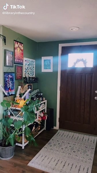 This is normal, right? No signs of obsession here at all. Y’all, that door is literally the front door of our house. This is what you see if you come through the front door. 😅 #booktok #myhomelibrary #bookshelf #bookhoarder #bookcollection #shelfie #nothingwrongwithme