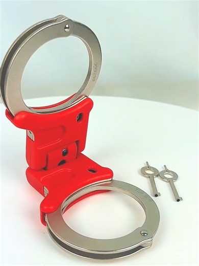 🚨 TCH850R Red Nickel Plated Rigid Folding Handcuffs 🚨 - Let's check them out! Made in the UK to the highest industry standards, TCH handcuffs are trusted by police and first responders worldwide. The TCH850R delivers the power and control of rigid cuffs with the compact mobility of folding cuffs. Once deployed, they lock into a rigid position and can only be released using a standard-issue handcuff key. A favourite for training, these cuffs feature a rigid folding design and red nickel plating