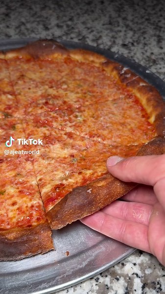 AJ (@ajeatworld) - Cheese pie 🍕 baked in my apartment oven at 550°F on a @bakingsteel for roughly ~7-8 mins (use code “ECHO” for 10% off baking steel - link in bio for my full at-home pizza setup) 🔥 • 385g dough ball stretched to 16 inches • 72hr cold ferment • 63% hydration 💦 • .225% instant dry yeast •2.5% salt •2% oil •1% sugar • @muttipomodorousa tomatoes 🥫 • @kingarthurbaking AP flour 🌾 • hand shredded blend of whole milk & part skim mozzarellas 🧀 #pizza #apizza #sandiego #newhaven #f