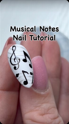 Breaking up the Christmas nails with a little music to your manicure 🎶💅🏽 This beginner-friendly tutorial shows how I painted a crisp white base, then added a treble clef, an eighth note, a quaver and a rest symbol to create this super cute music-themed nail. Perfect for my Jagged Edge (@official_je) “Cuffing Season” press-on set. If you love easy DIY designs, follow @allis.nailplace for more tutorials and nail inspo — your next set might just be a masterpiece 🎨✨ 🎶 Products used: liner brush