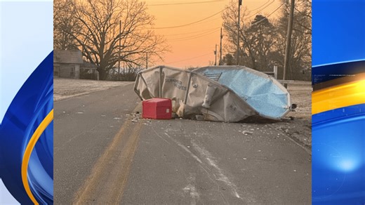 Above-ground swimming pool falls from trailer, causes hazardous road conditions in Morgan Co.
