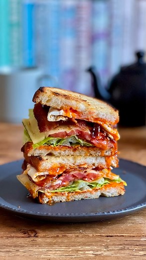 John Gregory-Smith on Instagram: "Hangover Heaven - recipe below - this is my ultimate hangover cure. It can dust off any night, however full on. Your welcome x JGS . Serves 1 | 2 tbsp mayonnaise - 2 tsp rose harissa - 1 tbsp olive oil - 2 slices sourdough - 4 rashers streaky beacon - 1 egg - A few cos lettuce leaves - 1 tomato, sliced - A slice of cheese – I use edam - Salt . 1. Heat a non-stick frying pan over a medium heat and mix the mayonnaise and harissa together in a bowl and rub the oil 