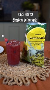 Chai Berry Shaken Lemonade! 🍋 🫐 Ingredients: 2 tablespoons Big Train Shaken Lemonade 2 ounces Island Oasis Wildberry Fruit Puree 2 ounces Oregon Chai Slightly Sweet Chai Tea Latte 4 ounces water Instructions: Step 1 Combine all the ingredients into a cocktail shaker with ice. Step 2 Shake to chill and combine the ingredients. Step 3 Strain into a highball glass over crushed ice. Step 4 Garnish & Enjoy! | Big Train