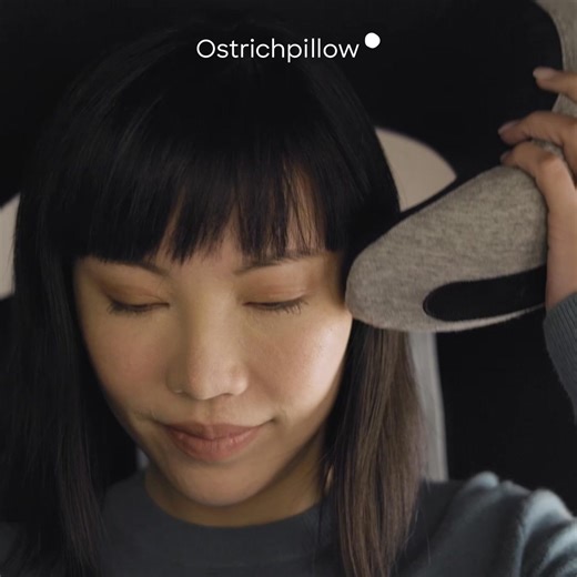 Not your average travel pillow. ✈️ Drift off in any direction with wraparound memory foam support from Ostrichpillow’s Go. | Ostrichpillow