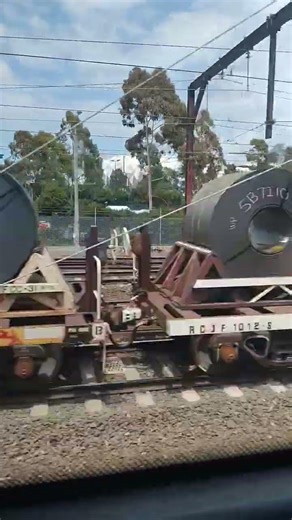 grain train steel roll coil and freight hold by qube and railfirst #freighttrain #train #graintrain