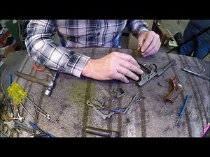 We give this Colt Woodsman a much needed makeover.