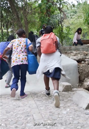 In case gunmen ever break into the Have Faith Haiti compound, staff regularly conduct surprise emergency drills. The children in the orphanage rush to a concrete bunker with steel doors. There is a generator, a month’s supply of food and water, and cameras to monitor outside. The orphanage is located inside Port-au-Prince, a city largely controlled by violent, armed gangs. From the outside, the compound looks like a prison with concrete walls that are 30 feet tall, barbed wire, and guard towers.