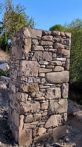 A sandstone and granite field stone pillar I built. It's 1 meter wide and 2 meters high. Built with a dry joint, raked back so it can't be seen. The stone came from an old mill on the property. This was an important one for me because I literally live over the hill from them and would be passing them every day. There is something special about using stone that was already laid 100 years plus ago. I hope that these pillars show how much them men's work was appreciated and respected #buildingstone