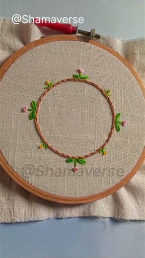 Shama khan on Instagram: "Minimal floral embroidery wreath made by hand 🌸🍀 | Easy Wreath Embroidery Tutorial for beginners 🪡 Perfect embroidery wreath for beginners – save this Idea💡 Hand embroidery floral wreath design made with simple stitches 🌸 This minimal embroidery wreath is perfect for beginners and daily practice. Use this wreath embroidery for hoops, wall decor, name frames & DIY gifts. Follow for more easy embroidery ideas ✨ . . . #embroiderywreath #handembroidery #floralembroider