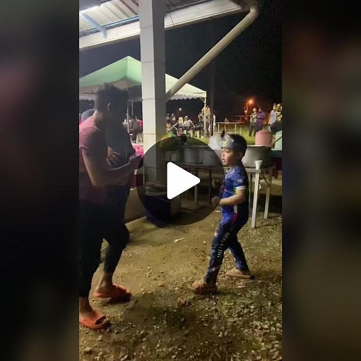 Playful Child Interaction in Nighttime Gathering