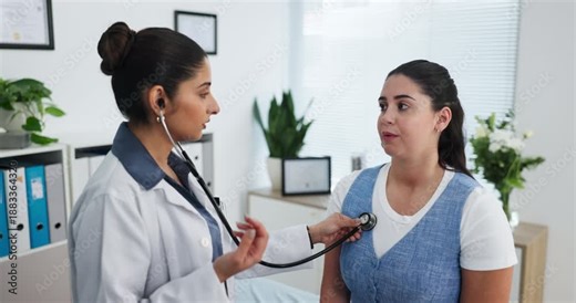 Doctor, woman and breathe with stethoscope for cardiology assessment, respiratory exam or advice. People, medical worker talk or patient in consultation with tool, lung evaluation or check heartbeat.