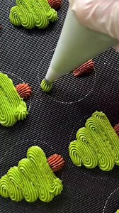 Christmas Cookies 🥰 dough preparation take a bowl softened butter 160g powdered sugar 60g mix well on a double boiler water temperature 32C room temperature egg white 36g add into two batches mix well on low speed low gluten flour 200g mix well take a bowl take 40g from the batter cocoa powder 8g stir evenly on the other batter bowl green matcha powder 10g stir evenly load into piping bag use a small 8-tooth piping tip make the cookies refrigerator for 30min before baking Bake in a preheated ov