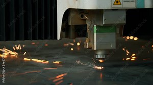 Modern metal laser cutter in action. Creative. Metalworking industry technologies.