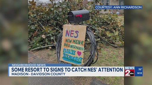 Some residents resort to yard signs to catch NES' attention