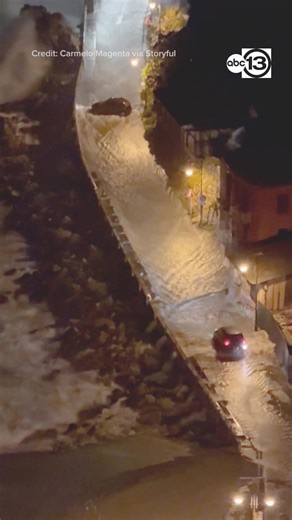 Massive waves crash into coastal Italy in the Calabria region forcing motorists to throw it in reverse. | ABC13 Houston