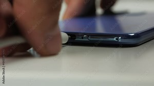 Close-up of the charging connection to your phone. Phone charging port. Charging your phone by wire.