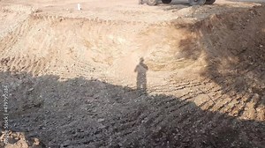 A close-up shot of excavator digger bucket teeth marks on the basement. - Digger's Bucket Marks