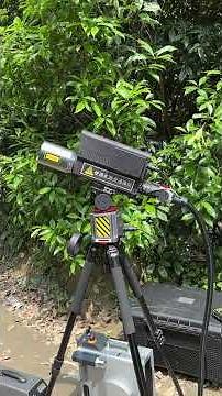 Portable Laser Obstacle Remover cutting trees and branches. Uncut Video