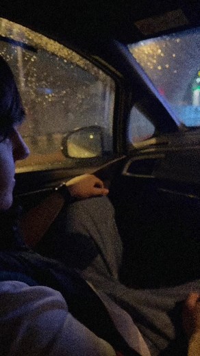 Nighttime Driving Journey Through Rainy Streets