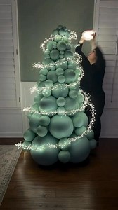 3.1K views · 27 reactions | •  Spiral Fairy Light Balloon Tree ✨ This is a new twist on a balloon Christmas tree. from @ balloons_by_victoria_dz #balloonchristmastree #balloontree #balloonarch #christmasballoons #balloondecorations #balloonbackdrop #holidayballoons #fairylights #customballoons #balloonideas #balloontutorial #balloonartist #sempertex #betallic #phillyballoons #buckscountyballoons #montcopa #balloonsbyvictoria #fbreelsfypシ゚ | Elegant Creators | Facebook