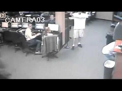 Elderly Man Shoots Robbers at Internet Cafe