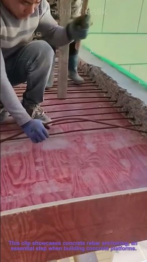 Concrete Rebar Anchoring: Workers Securing Reinforcement Bars