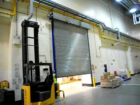 Electrically operated fire rated roller shutter door.