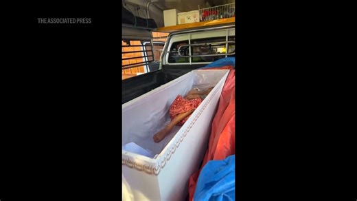 A woman in Thailand shocked temple staff when she started moving in her coffin after being brought in for cremation. | AP