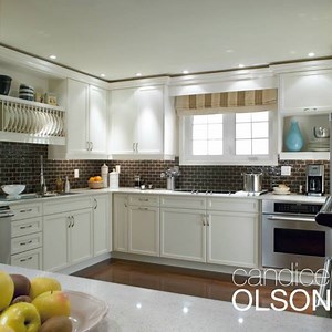 7.4K views · 661 reactions | To lighten the whole kitchen, we installed recessed lighting; added small pendant lights over the prep counter, replaced the cabinetry in a rich vanilla finish and installed light Quartz countertops with flecks of cream and brown. Thermador #TBT | Divine Design with Candice Olson | Facebook