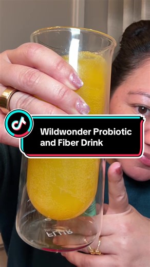 Replying to @koreanconven | TTS to be fair, you should eat your beans AND drink your Wildwonder. Upping my fiber and probiotics have helped me so much. I aim for 30 grams of fiber a day and there are only so many cups of beans and veggies I can eat in a day. But a glass of this delicious drink, I can do all while getting in 5 grams of fiber. So tasty, so refreshing and so easy even on the go. If you haven’t tried these yet, this is my favorite flavor. #mangodrink #wildwonder #fiberdrink #gutheal