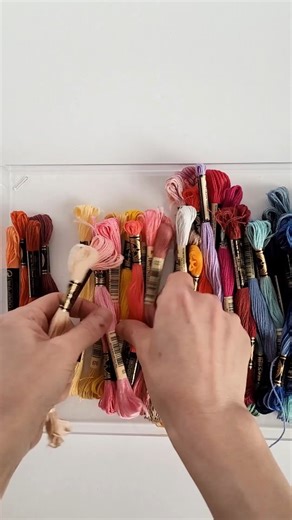 Modern Quilts | Shannon Fraser on Instagram: "Thread therapy in session 🧵✨ Organized my DMC stash using a Ferrero Rocher box (because why not?). How do you store your embroidery threads — neat rows or beautiful chaos? #modernembroidery #dmcthread #threadstorage #ferrerorocher #shannonfraserdesigns #makersgonnamake #mondaymaker #slowstitching #craftyorganization #embroiderythread #howihue #sewtherainbow #colorcolourlovers #abmcrafty #makerspace"