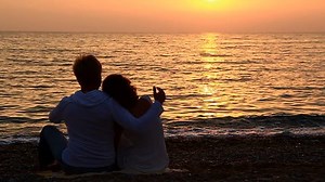 clip-3677831-young-couple-on-beach
