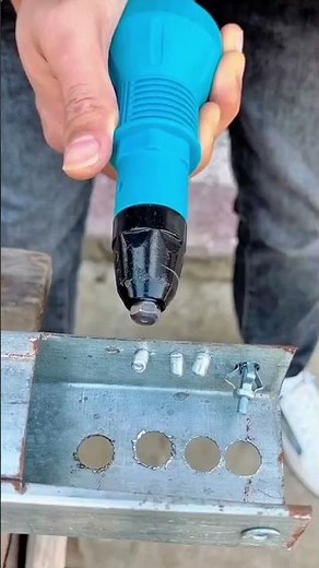 Using a Rivet Gun to Fasten Metal Plates