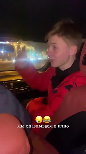 Rhythmic Dance Moves Inside a Car at Night