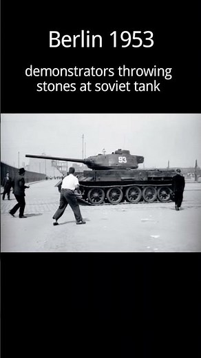 ⓐⓘ demontrators throwing stones at soviet T-44 tank in Berlin 1953 #berlin #ddr #soviet #tank #ai