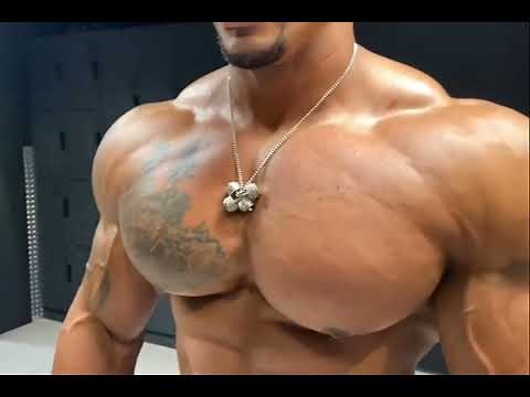 Black muscle god Patrick Moore showing his big muscle pecs (Extended)
