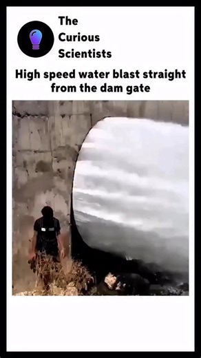 Science | Interesting | How it works on Instagram: "A dam sluice gate releases high-pressure water at full force, creating a powerful sheet-like outflow. The person standing nearby highlights the immense speed and volume of water, which can be extremely dangerous due to its force and current. Such gates are opened to regulate reservoir levels, manage flood control, or supply water to irrigation canals and turbines in hydroelectric systems. Standing close to an open sluice gate is highly risky an