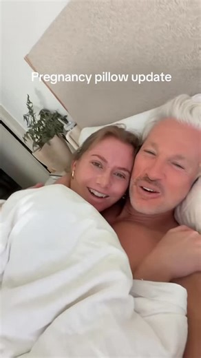 Michael Justin on Instagram: "Anti-Intimacy Pillow lol @em_stomatuk #couple #laugh #agegap #pregnant"