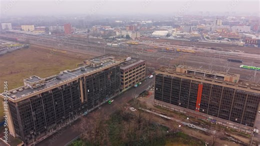 Urban Structure and Skyline : An expansive aerial view showcases a meticulously designed city, with rows of symmetrical buildings stretching into the distance and an inspiring skyline.