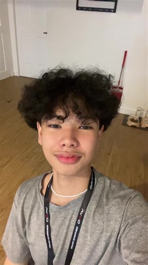 Casual Indoor Video with Curly-Haired Individual