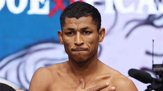 Boxing champ rushed to hospital during weigh-in with late plea for replacement