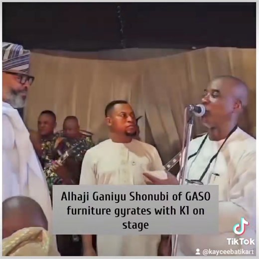 Alhaji Ganiyu Shonubi of GASO furniture gyrates with K1 on stage | Yoruba music entertainment and african textiles