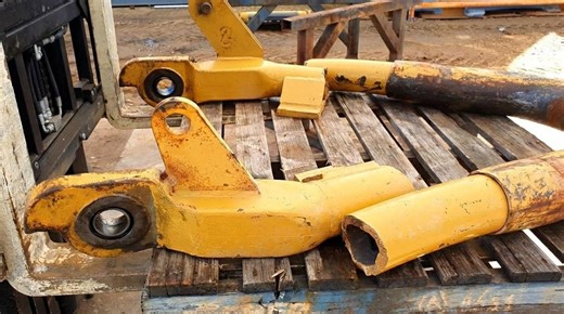 Repairing a CAT 637 scraper bail arm