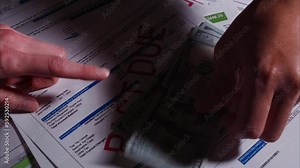 Caucasian Woman Demands Payment for Overdue Bills while Latino Man Pays Cash. Shot with ARRI Alexa in ARRIRAW at 23.98 fps and exported QuickTime Apple Pro Res 422 HQ.