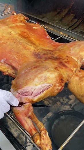 yummy food (Cutting old ham and Roasted whole sheep )