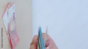 female hands count paper 10, 20 euro banknotes, puts on table, concept of human poverty, devaluation, inflation, payments to fund, gift for holiday, social assistance poor, 4K vertical video Stock Video