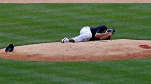 Yankees pitcher Tanaka alert after being hit in head by line drive
