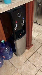 What is happening here?!? Primo bottom loading water dispenser shooting water out of unknown hole.