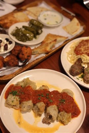 If you haven't had Greek cabbage rolls, here's where to get it! By the time you leave this restaurant, you're going to think that you were adopted by a big Greek family 😆 This is why I love locally owned businesses! | Rachel Phương Lê