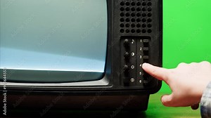 Retro Style TV Set with Green Screen chroma key background, vintage 60s analog television with grain and noise.